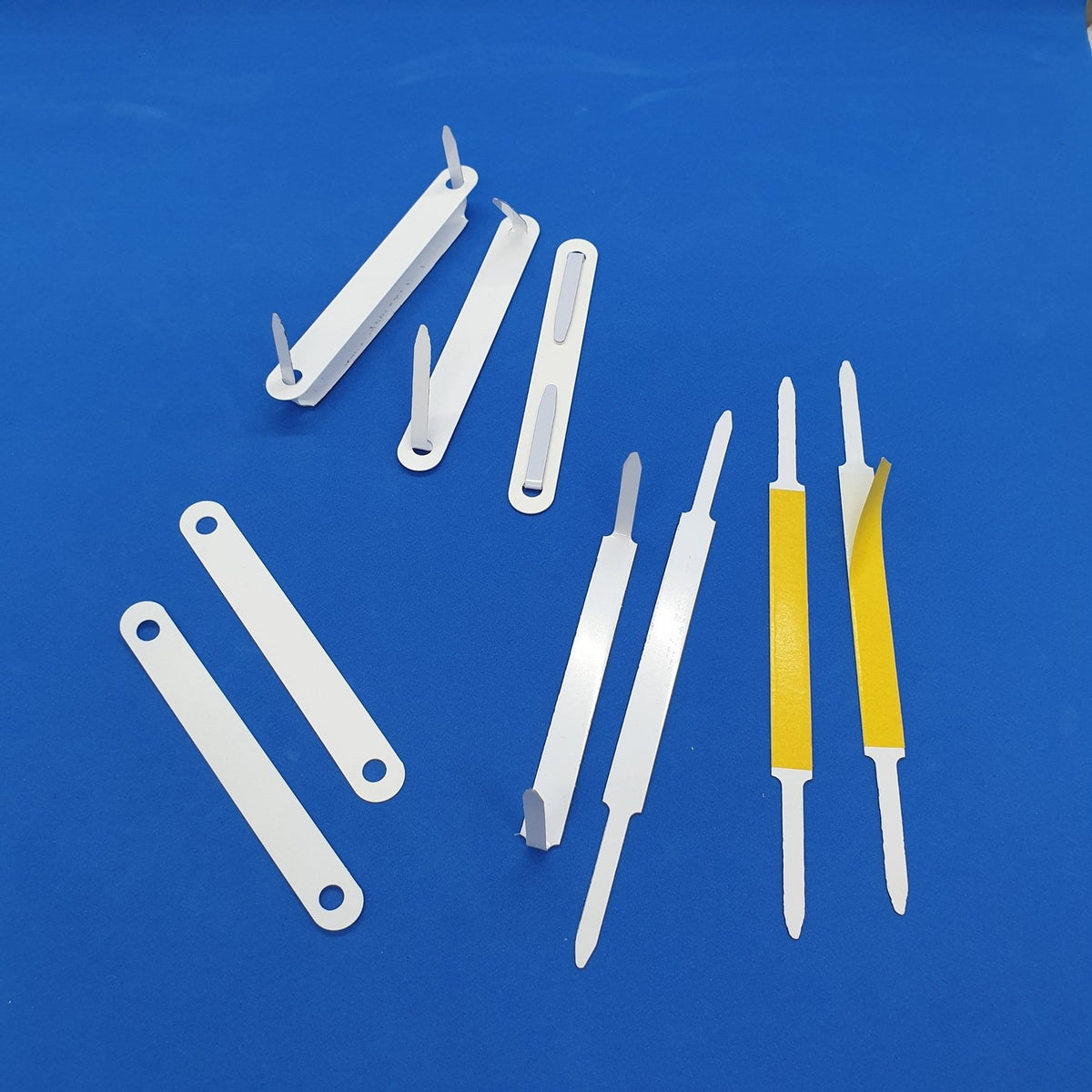 Adhesive Metal Filing Prong Fasteners with Plastic Cover — Hang and Display