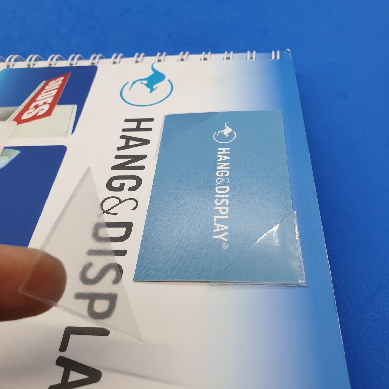 Clear Adhesive PVC Corner Triangle Pockets — Hang and Display