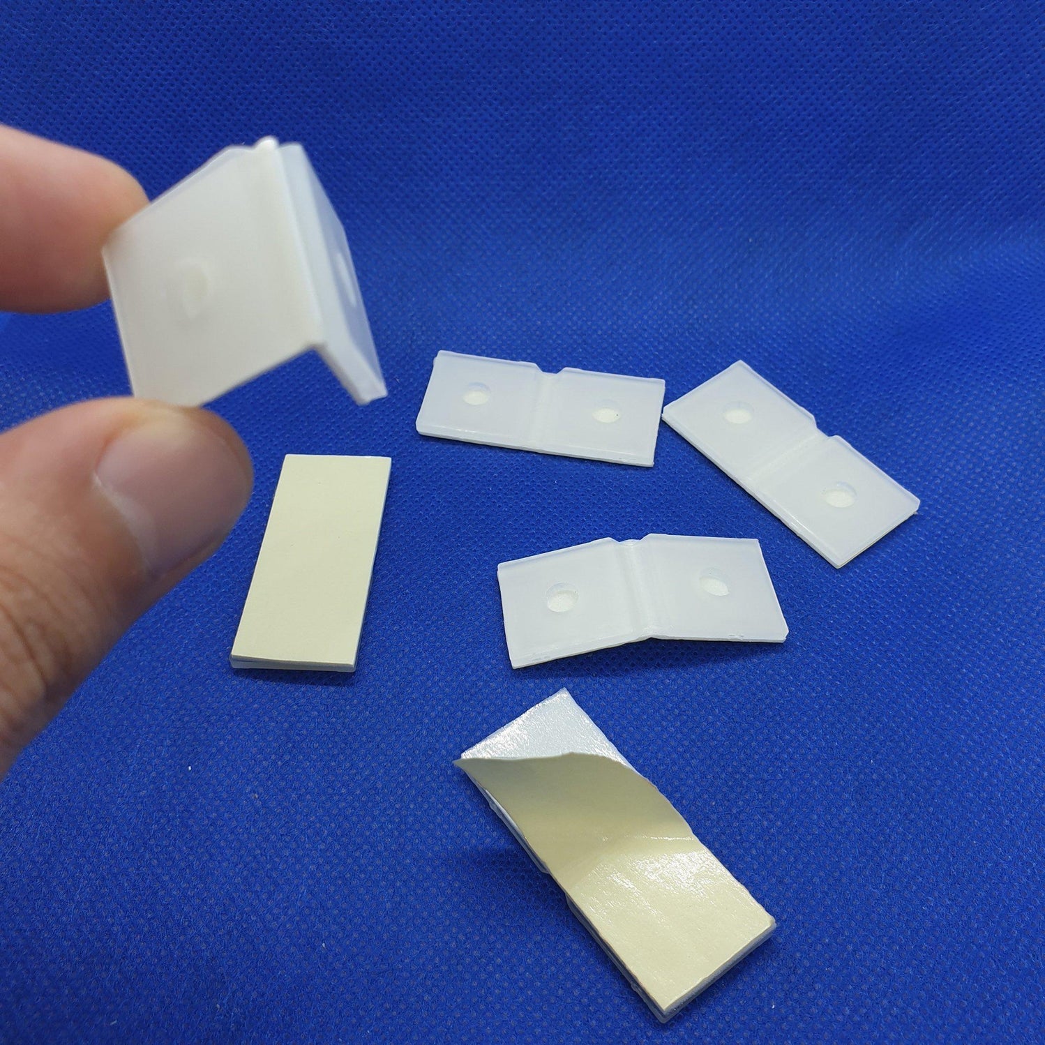 Plastic Hinge with Adhesive and Holes COR14 — Hang and Display