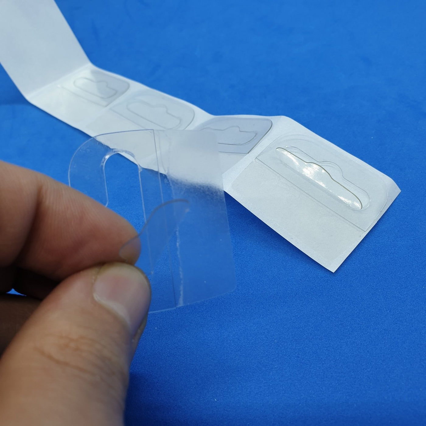 Self Adhesive Hang Tabs Flexi Euro Slot on Reel REF-364 — Hang and Display