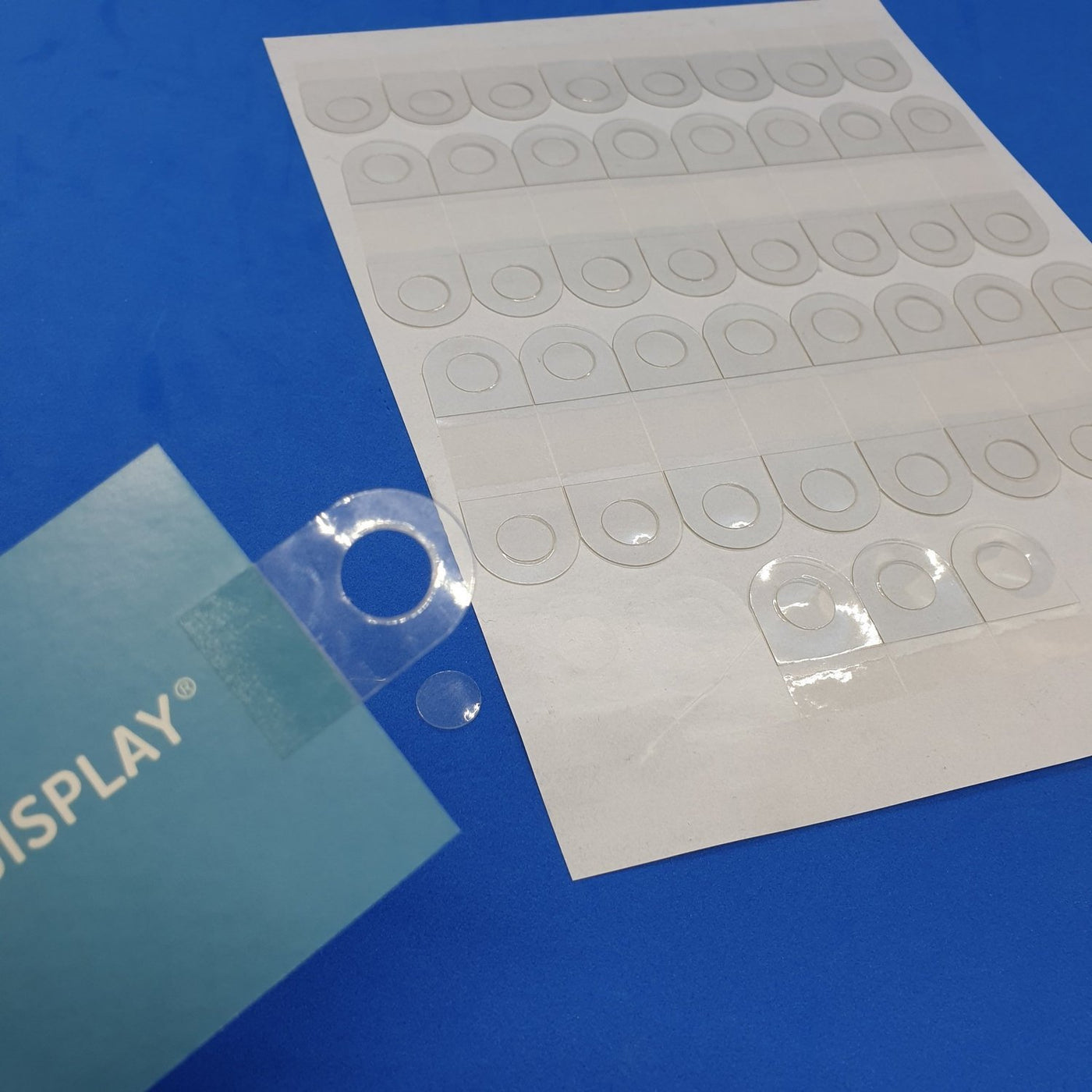 Self Adhesive Hang Tabs Round Hole on Sheet REF-55430 — Hang and Display