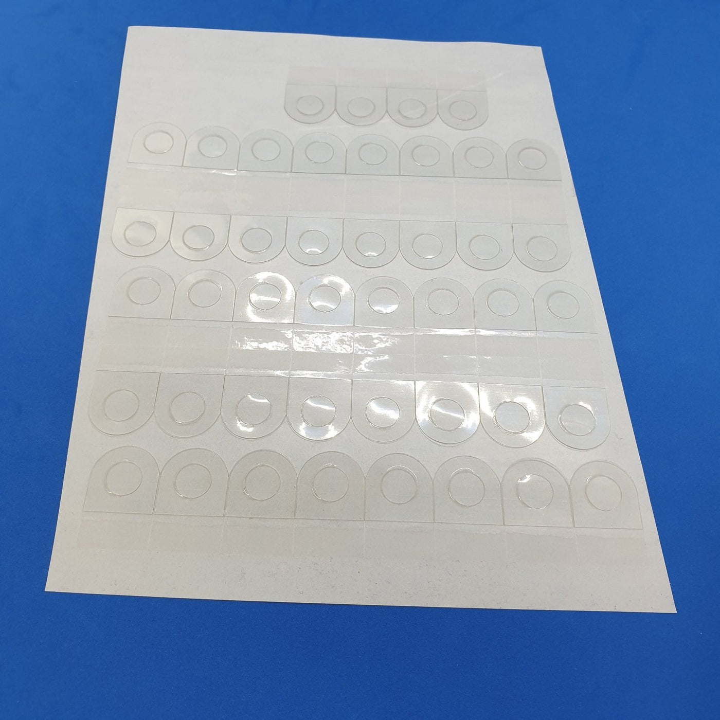 Self Adhesive Hang Tabs Round Hole on Sheet REF-55430 — Hang and Display