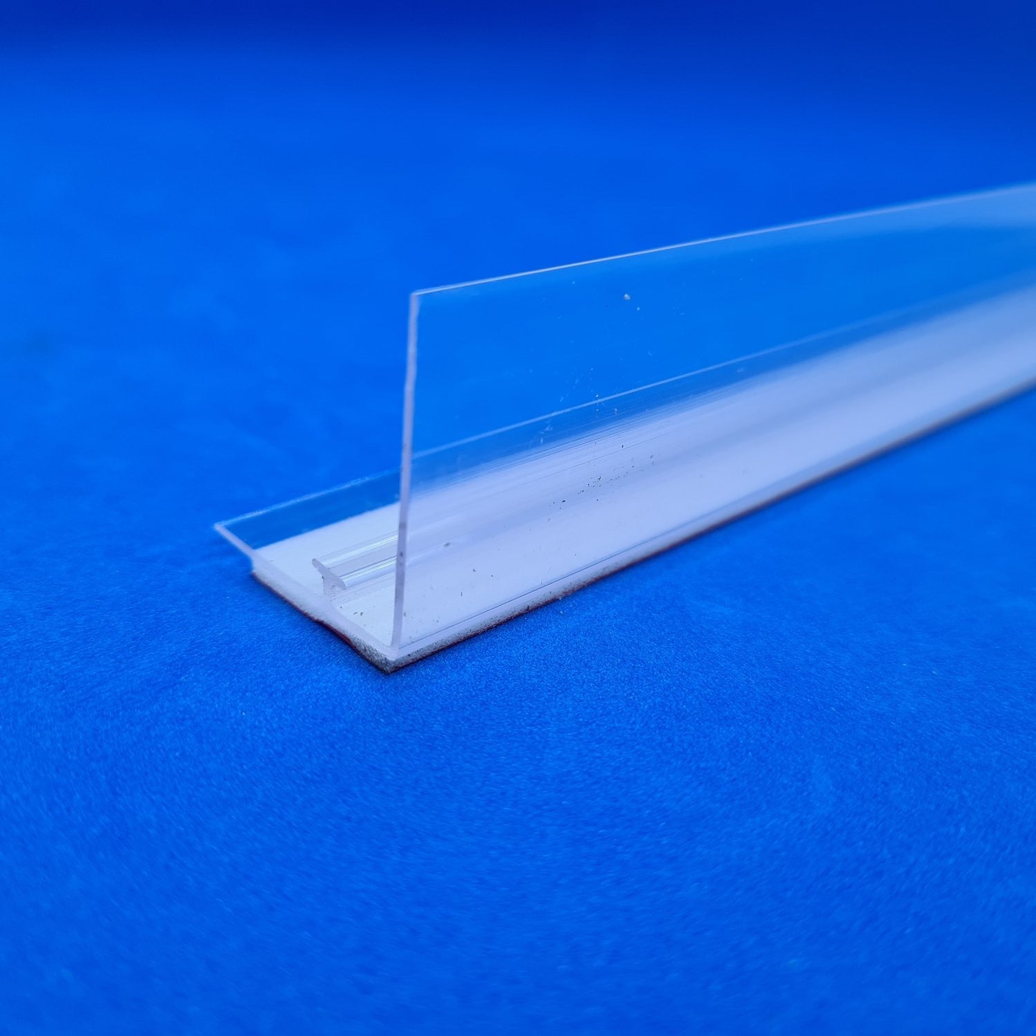 Shelf Stopper Strip Clear PVC with T-Rail and Adhesive Base — Hang and ...